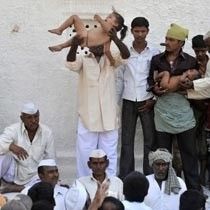 Bizarre baby throwing festival in India - Telegraph - Telegraph