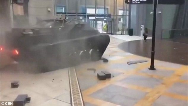 The tank broke the wall and entered a shopping center, but it was all ...