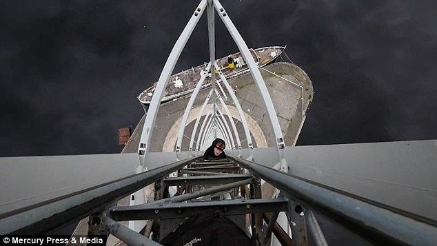 They climb the high building without any protective equipment, they ...