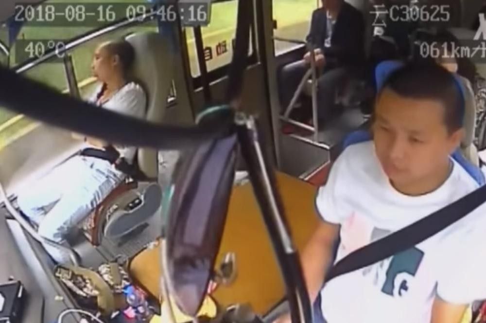 Although the giant stone hits him on the head, the Chinese bus driver ...