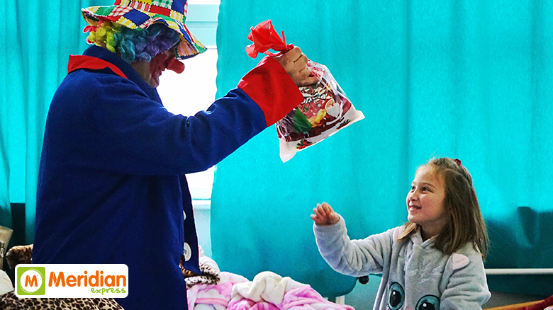 Meridian Express distributed hundreds of gifts for children - Telegraph ...