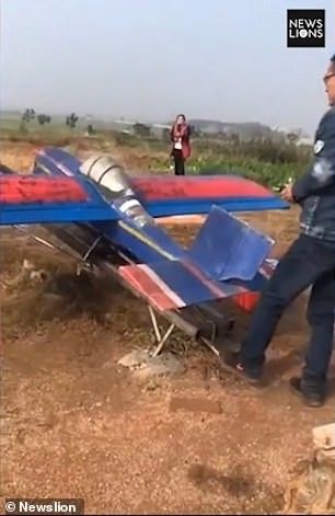 The chicken tied to a parachute was released from the light plane ...