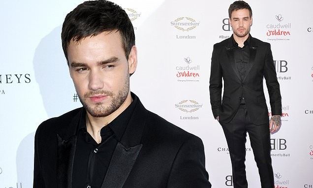 Liam Payne looks stylish in black suit as he donates £40 to disabled ...