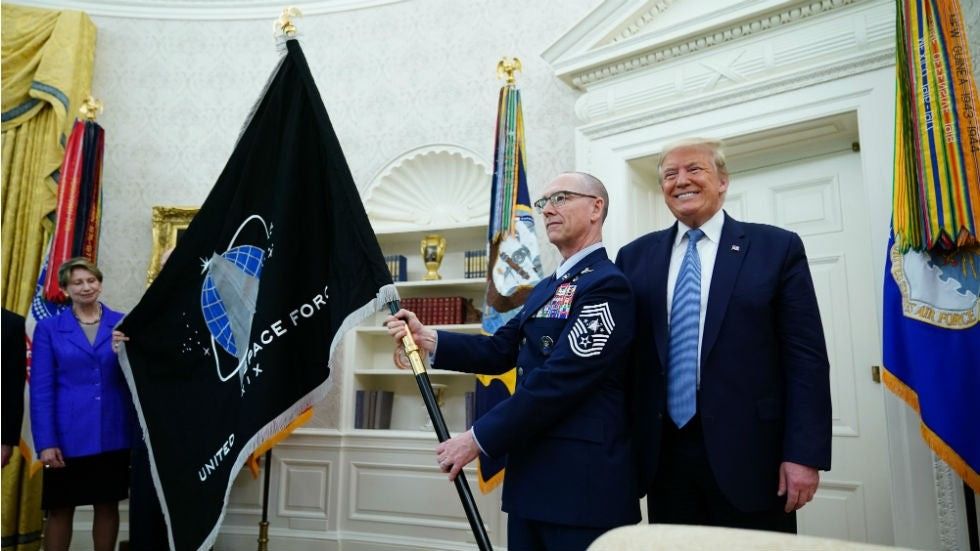 The US Space Force flag is unveiled in the Oval Office of the White ...