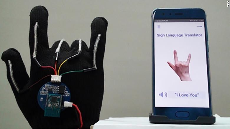 Scientists develop a glove that translates sign language into speech ...