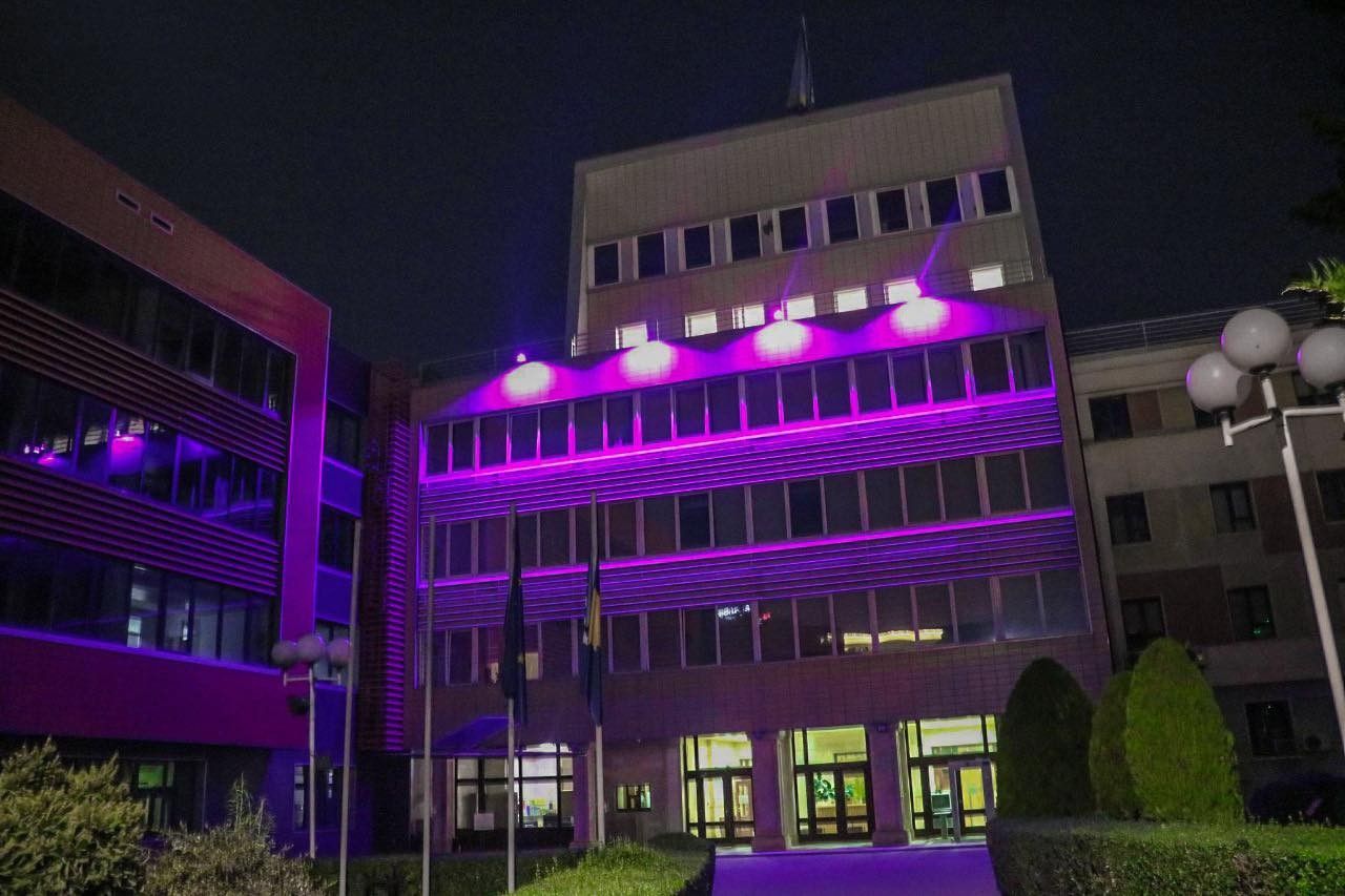 The building of the Assembly of Kosovo is lit up with pink color ...