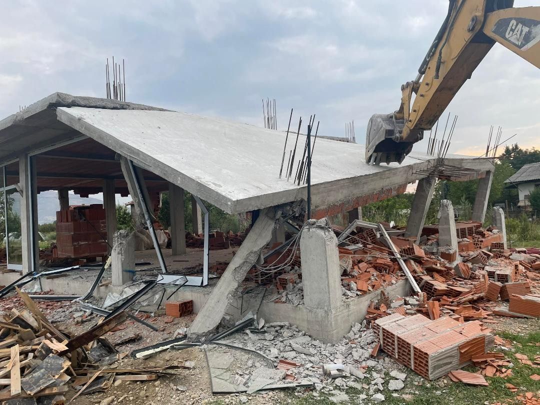 An unauthorized building is demolished in Gazi Baba in Skopje, a ...