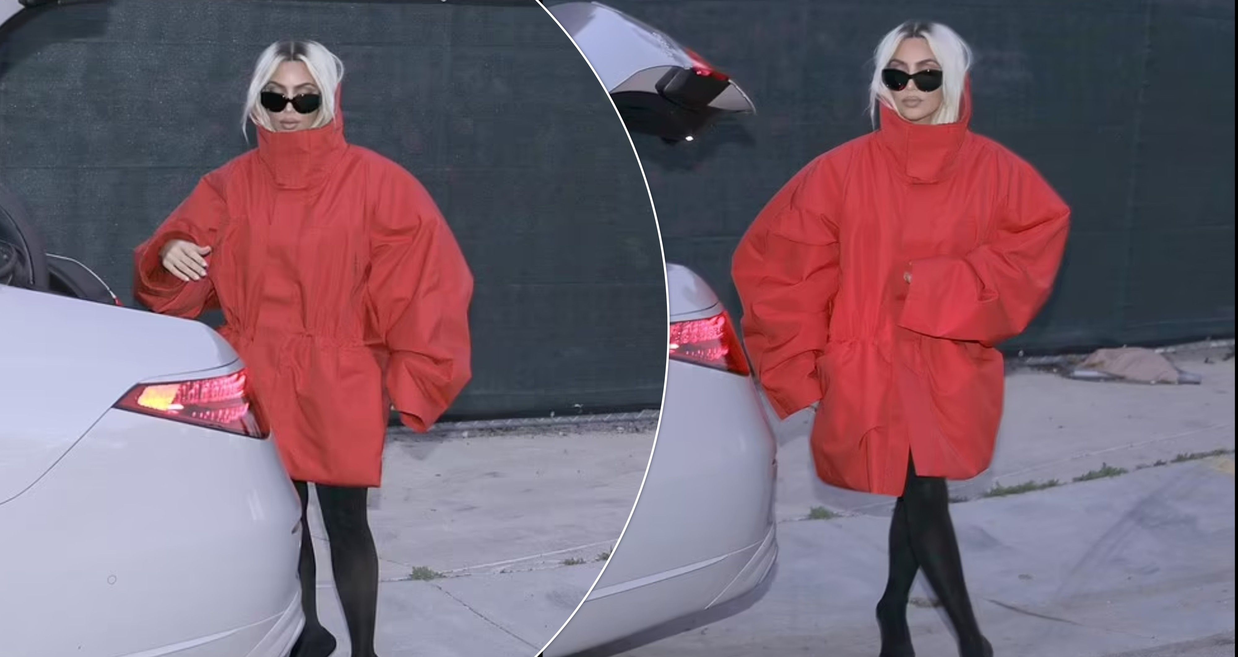 Kim Kardashian covers up with a big red coat and shows off her new ...
